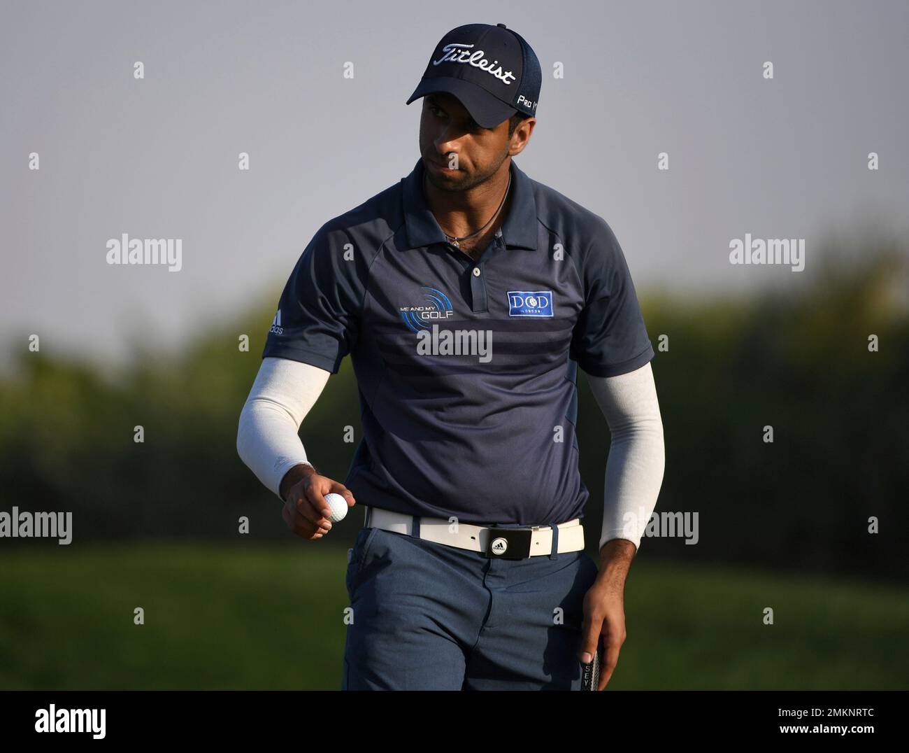 Aaron Rai of England reacts after putting on the 16th green in round ...