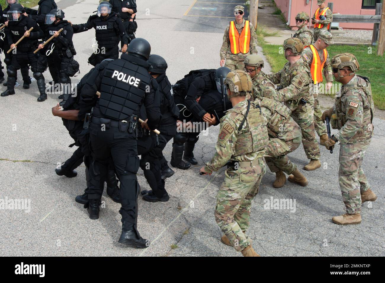 Members of local, state and military police riot training at Camp ...
