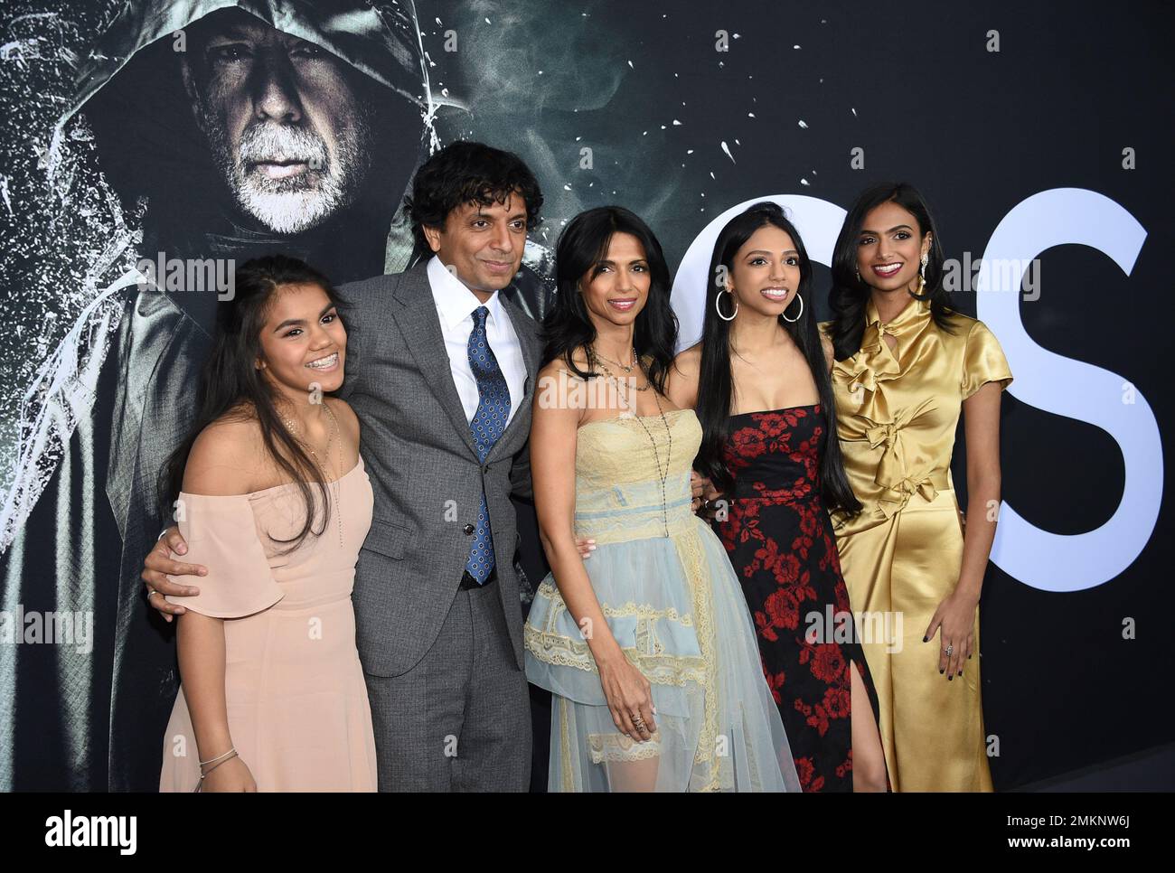 Director M. Night Shyamalan poses with his wife Bhavna Vaswani and ...