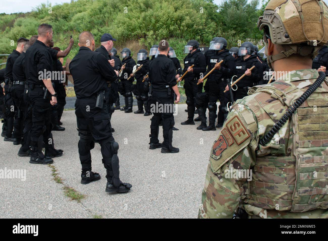 Members of local, state and military police riot training at Camp ...