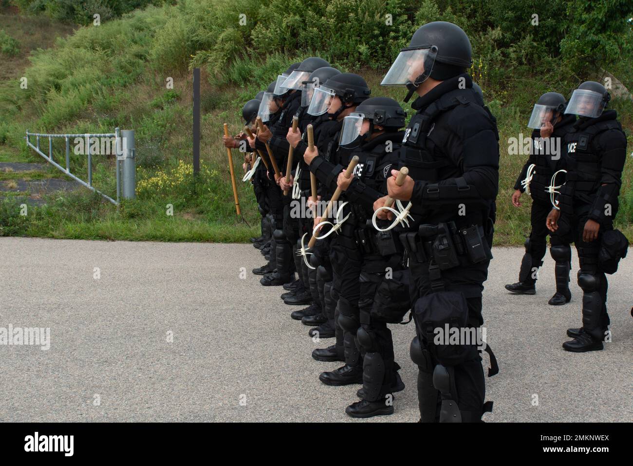 Members of local, state and military police riot training at Camp ...