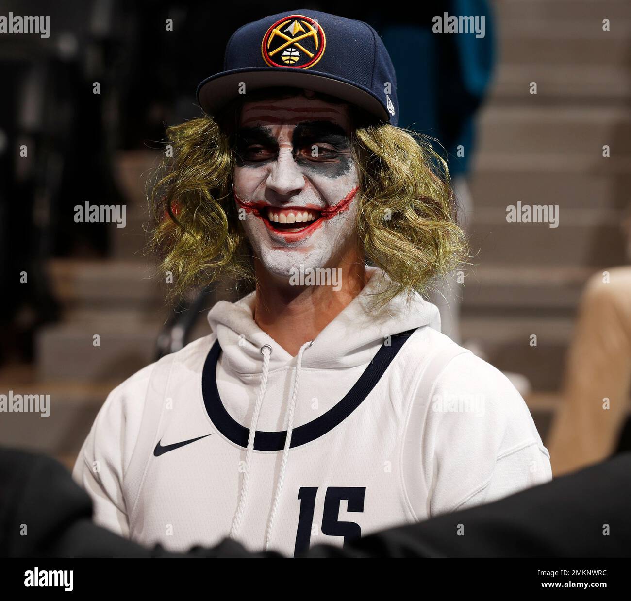 A Denver Nuggets fan wears face paint to match the nickname, Joker, of ...