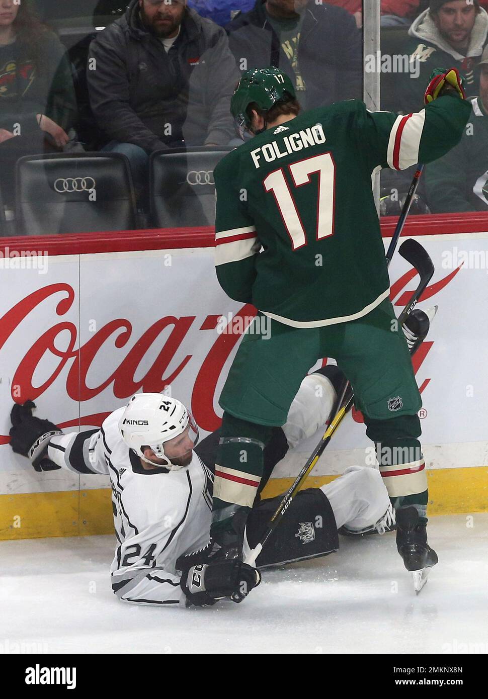 Minnesota Wild's Marcus Foligno, right, checks Los Angeles Kings' Derek ...