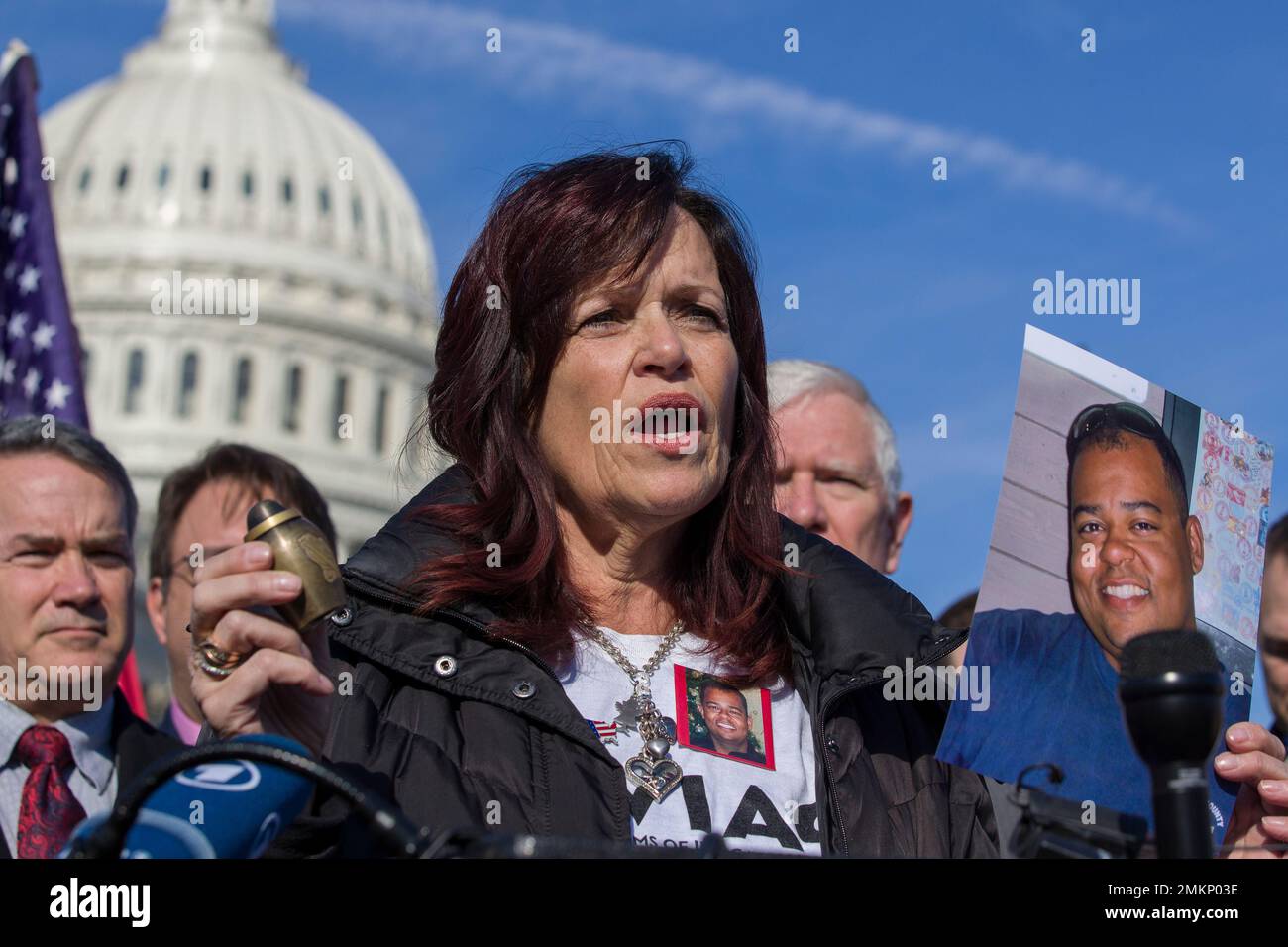 Sabine Durden, holds ashes of her son and a picture of her son Dominic ...