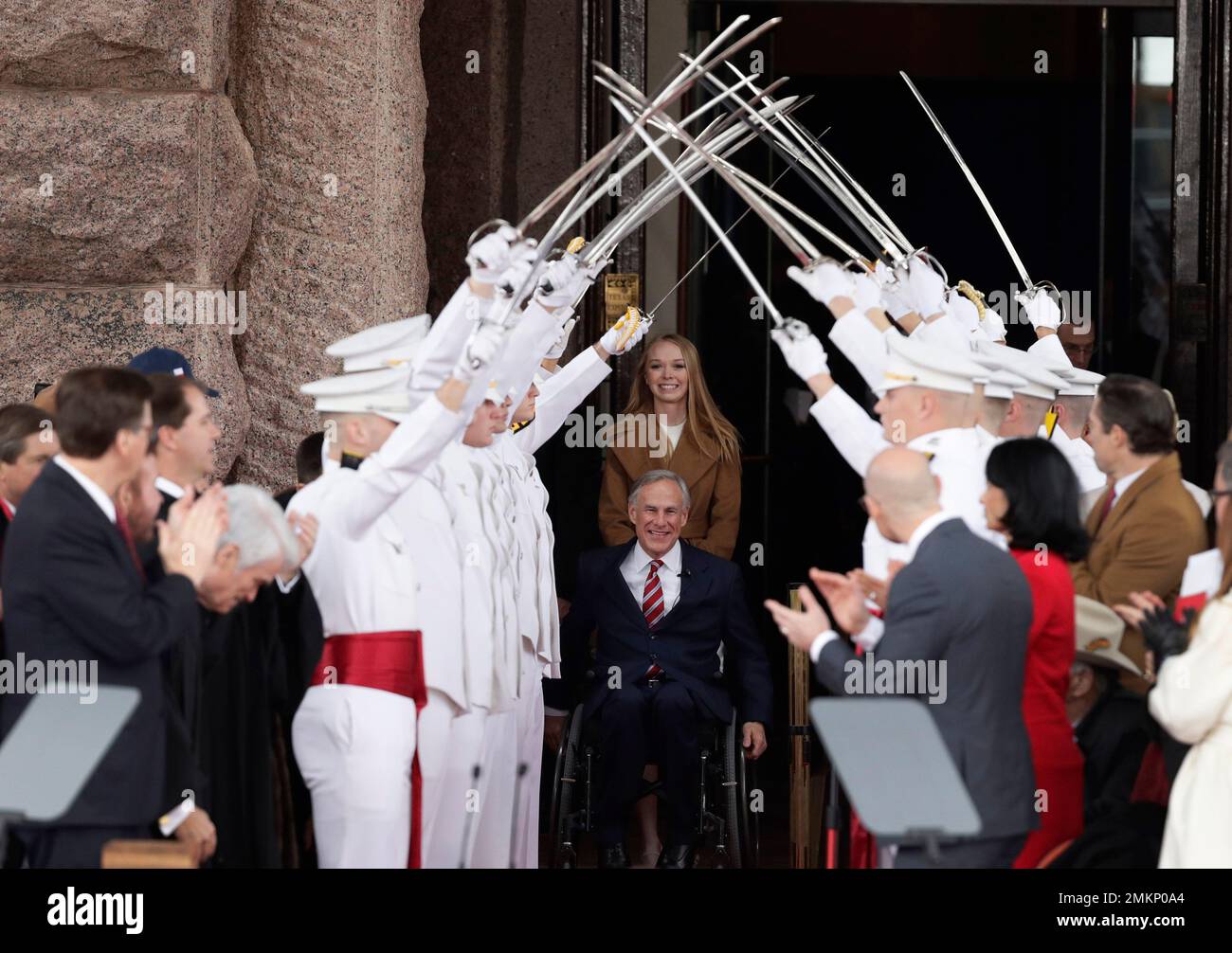Texas Gov. Greg Abbott, front center, arrives for his inauguration ...