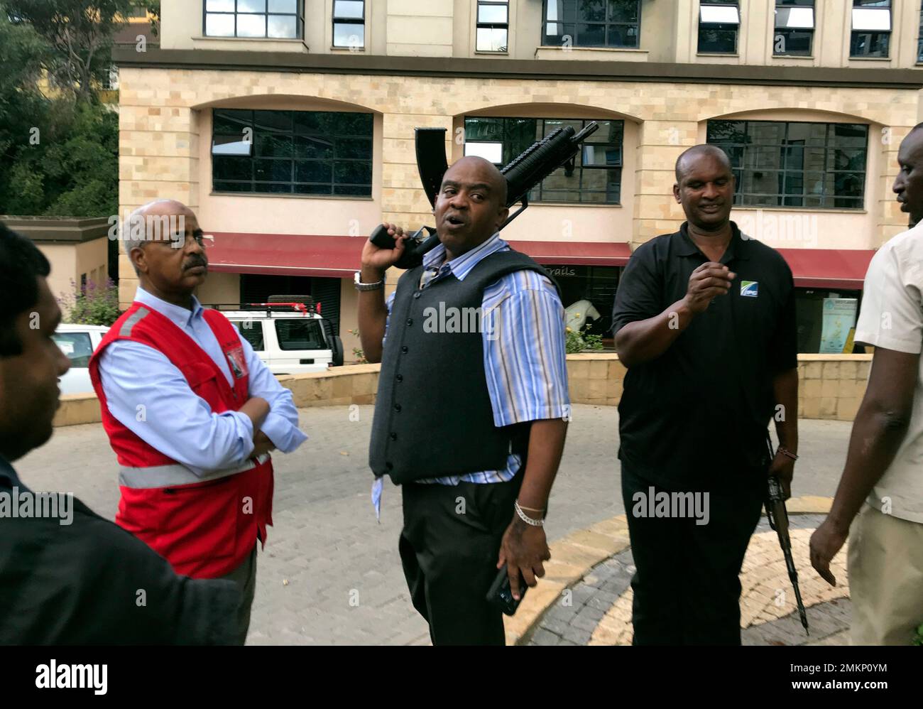 Security forces are seen at the scene of a blast in Nairobi, Tuesday ...