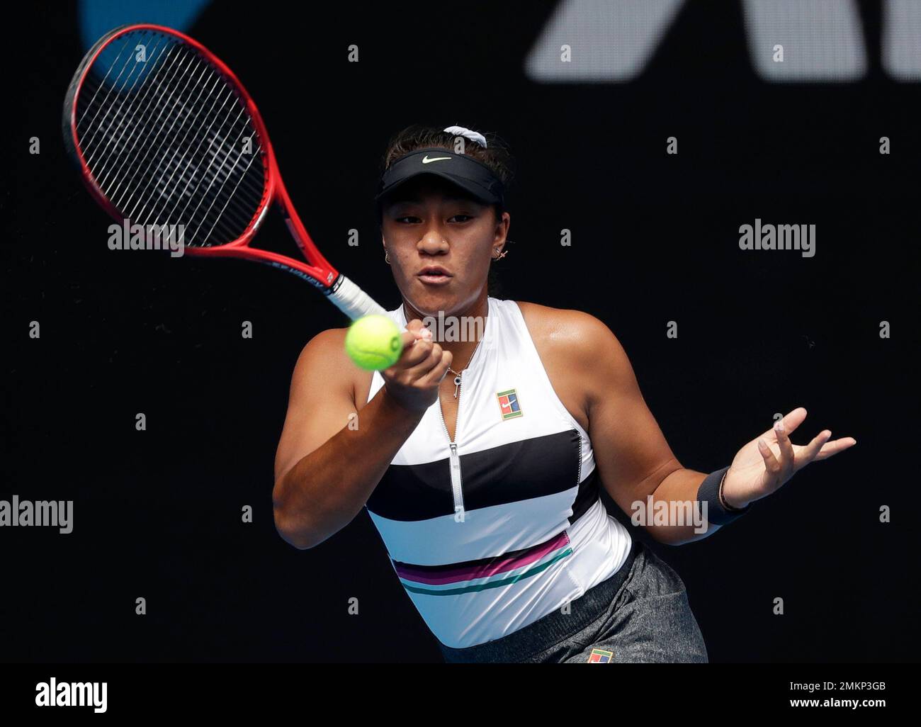 Australia's Destanee Aiava hits a forehand return to United States ...