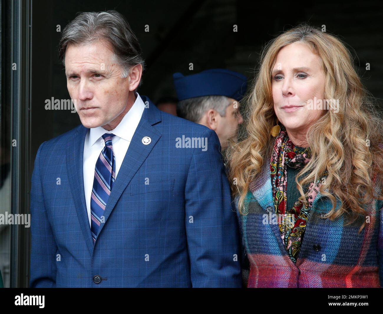 Mike Hunter, left, arrives for inaugural ceremonies with his wife ...