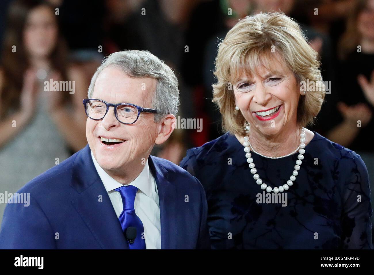 Ohio Governor Mike DeWine and his wife Fran react during a public ...