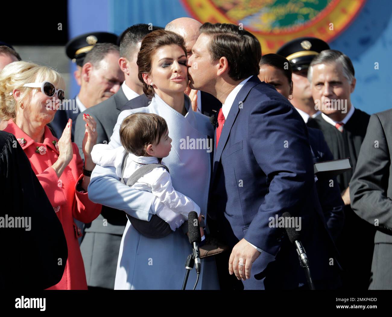 Florida Governor Ron DeSantis, right, kisses his wife Casey during an ...