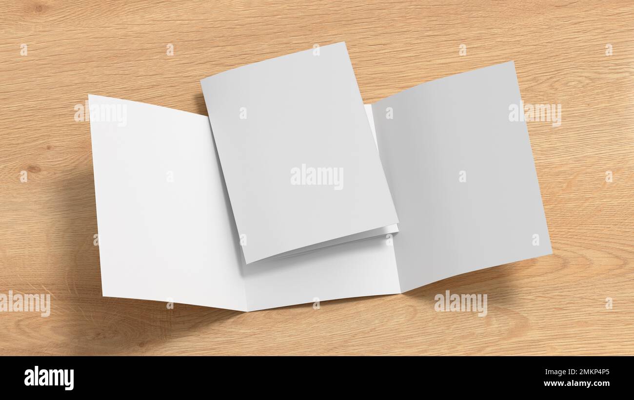 Trifold brochure A4 booklet mockup on wooden background Stock Photo - Alamy
