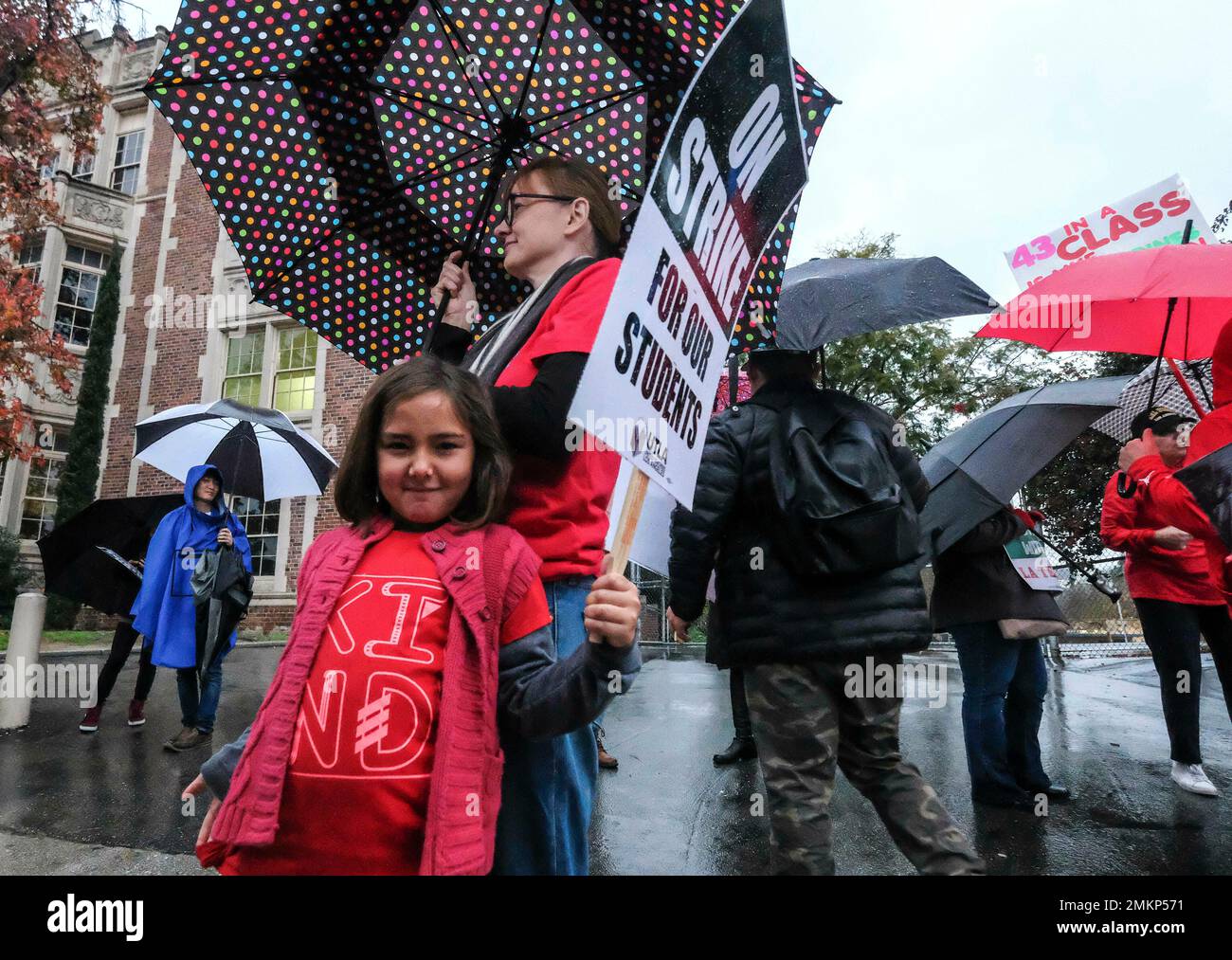 Julia Zapata, 7, holds a sign in support her mother Eleanor Barbour ...