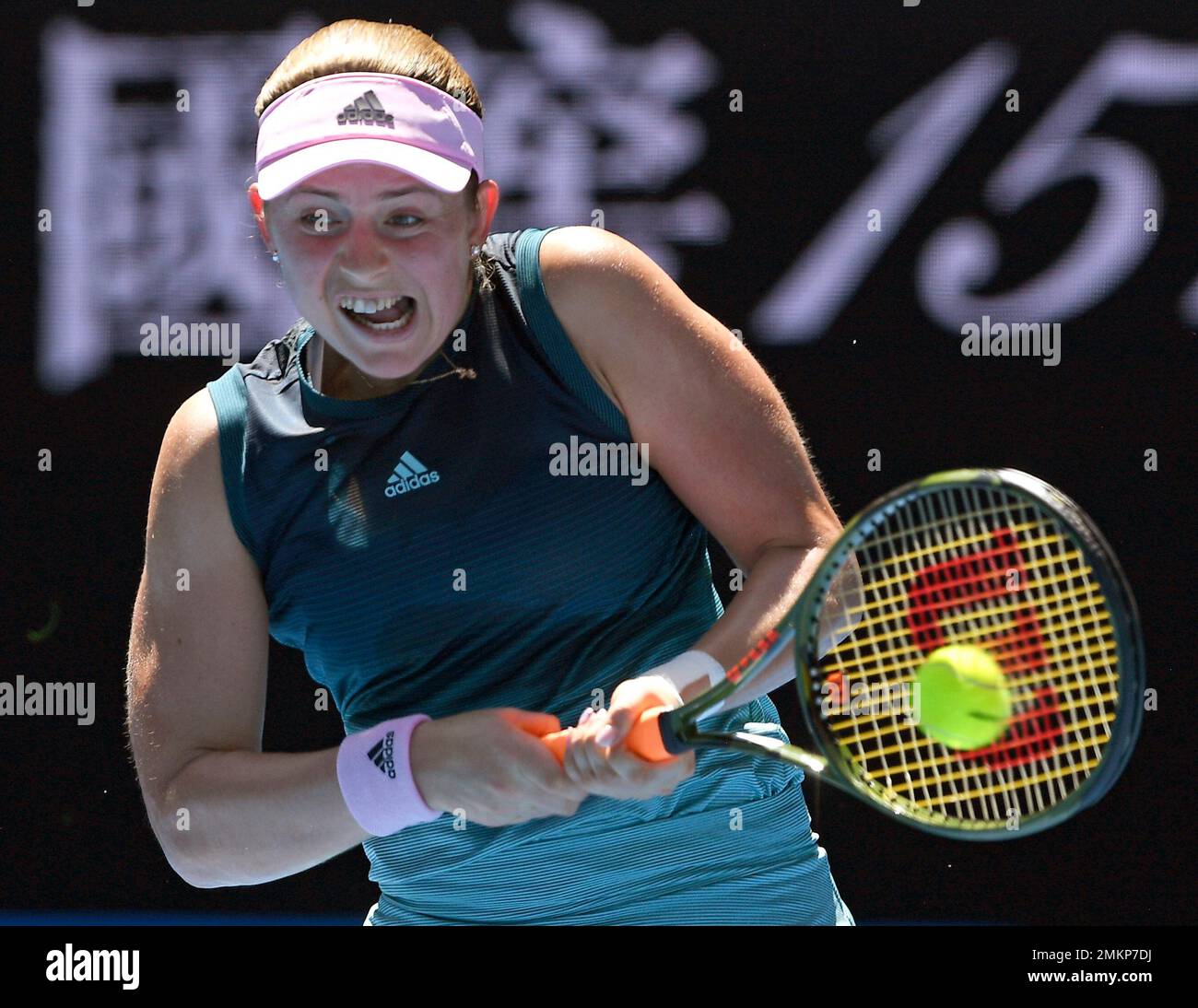 Latvia's Jelena Ostapenko makes a backhand return to Greece's Maria ...