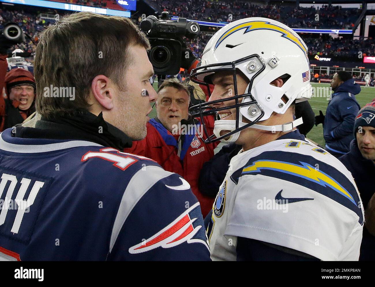 New England Patriots quarterback Tom Brady, left, and Los Angeles ...