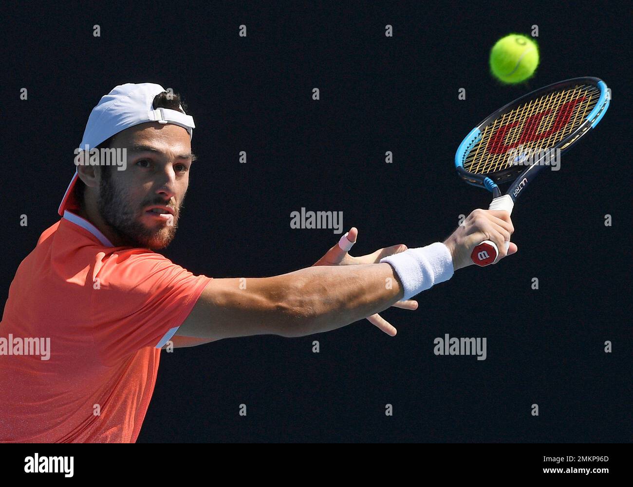 Italy's Stefano Travaglia makes a backhand return to Argentina's Guido ...
