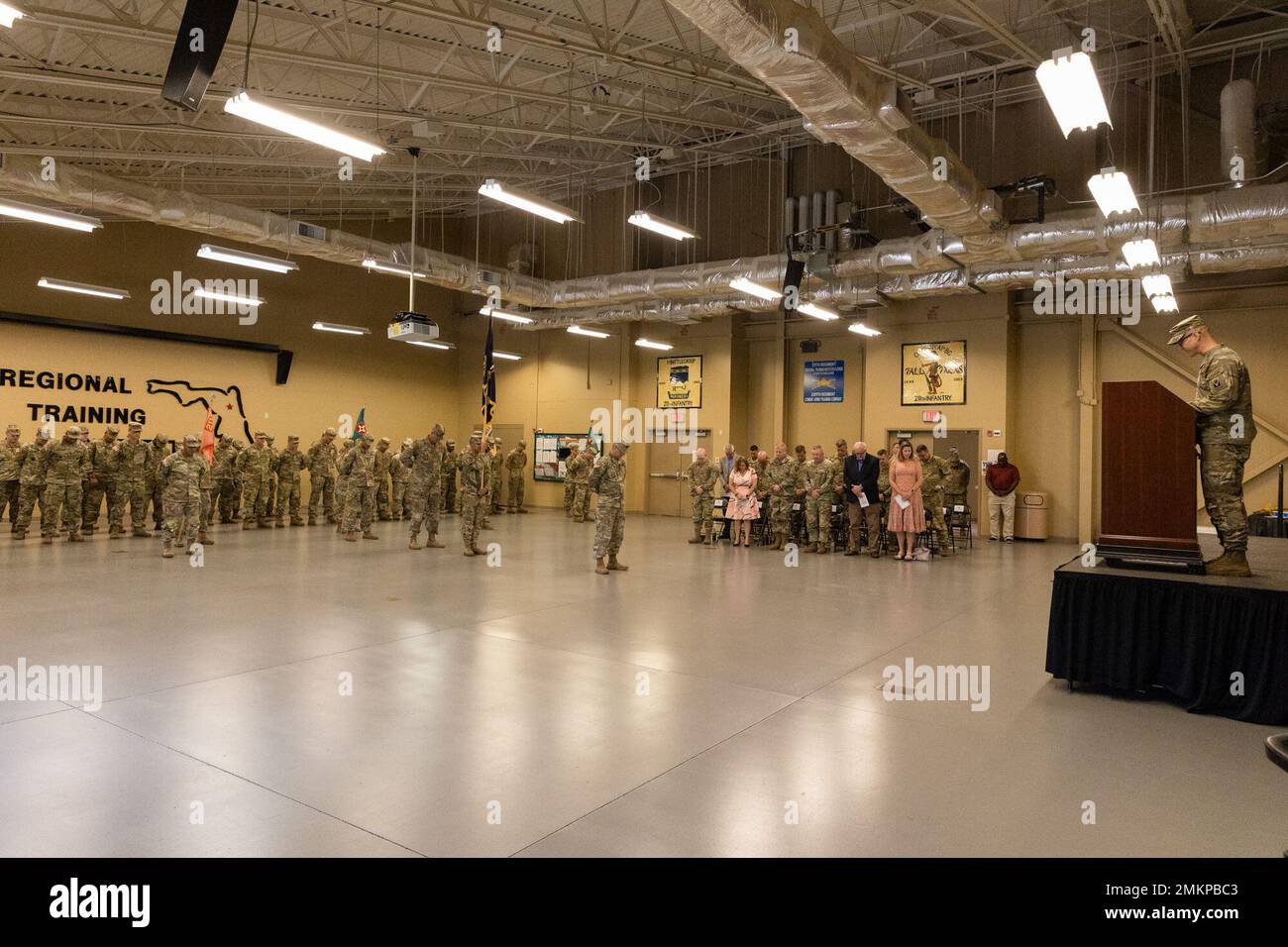 Major Lance Sellon, gives the invocation during a change of command ...