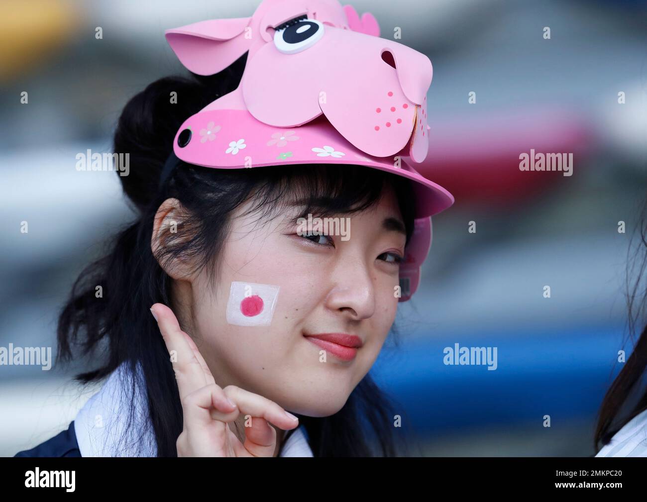 A Japan supporter gestures prior to the the AFC Asian Cup group F ...
