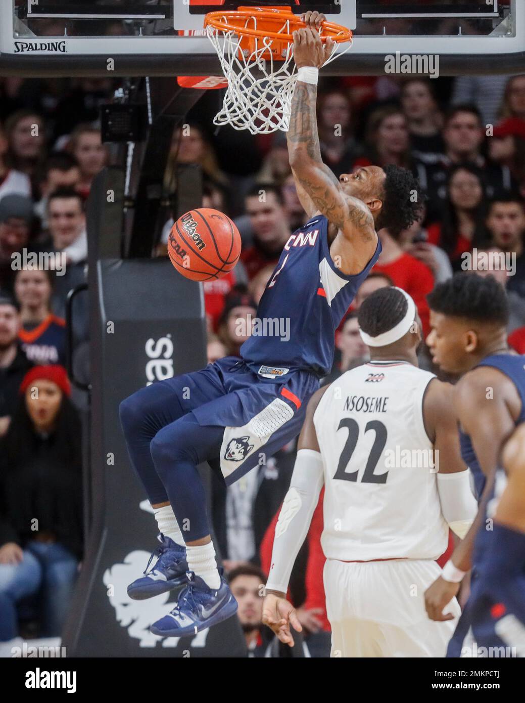Connecticut's Tarin Smith dunks in the first half of an NCAA college ...