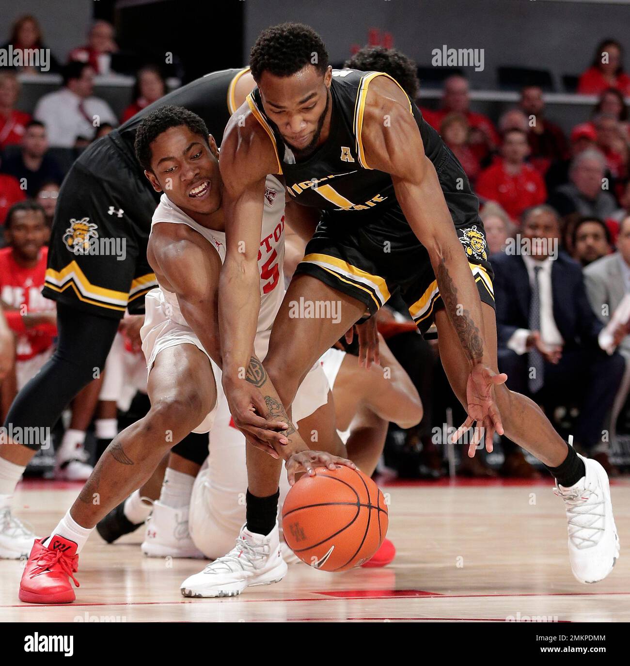 Houston forward Brison Gresham, left, and Wichita State forward Markis ...