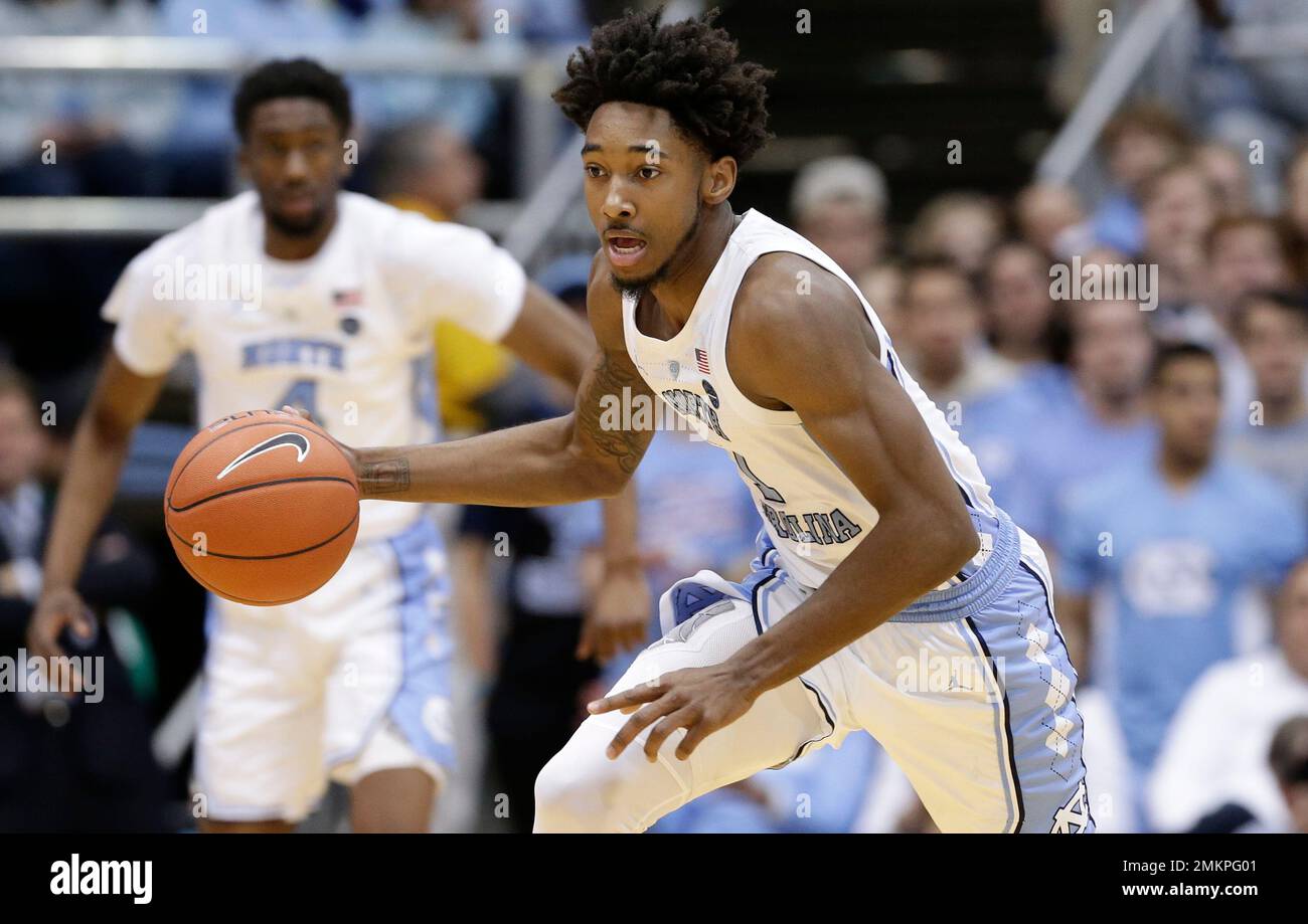 North Carolina's Leaky Black dribbles during the first half of an NCAA ...