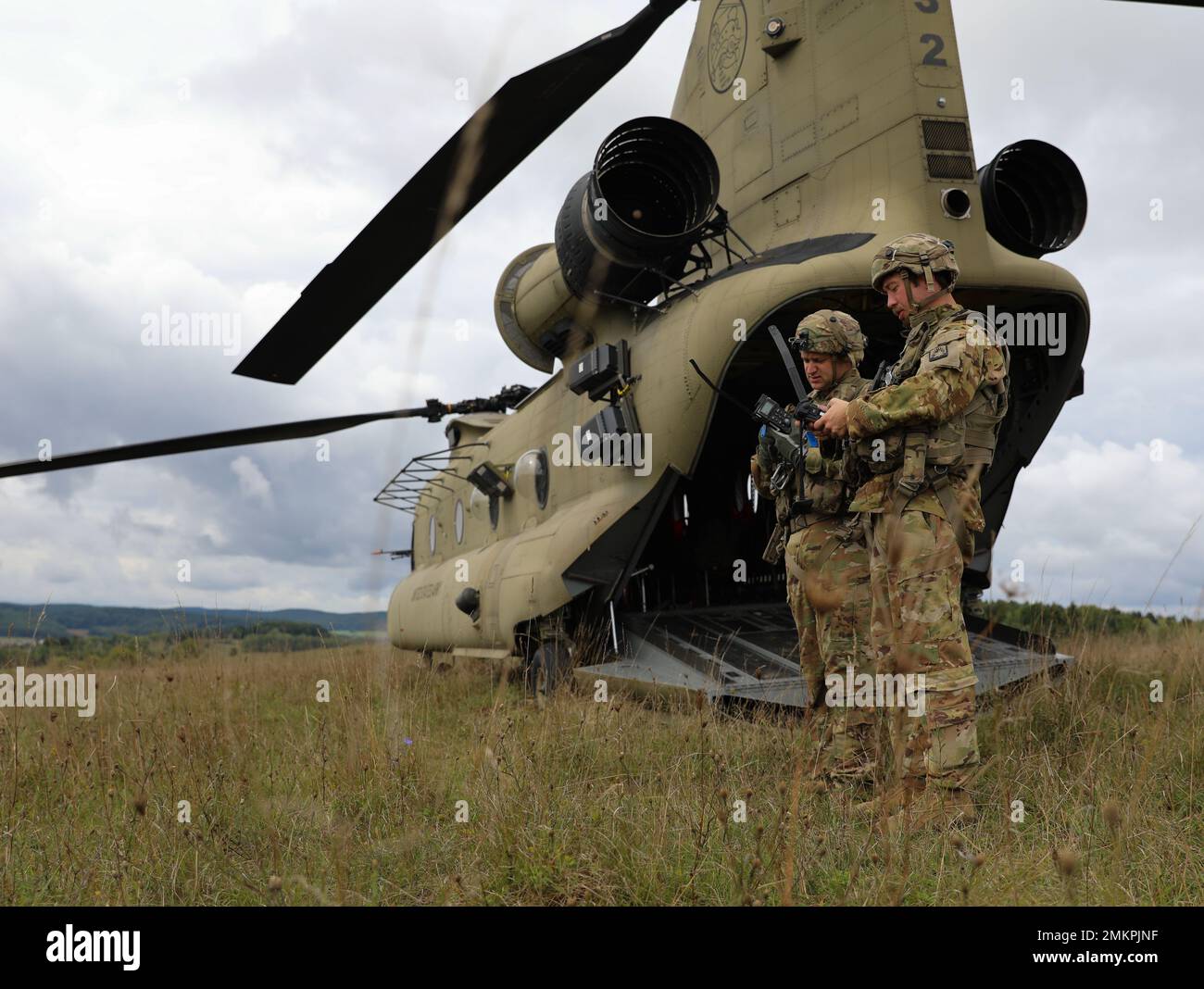 U.S. Army Sgt. Matthew Cullen (left) and Chief Warrant Officer 2 Austin ...