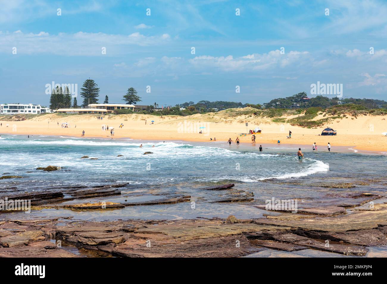 North Narrabeen beach on east coast of Sydney, large rock ledge around ...