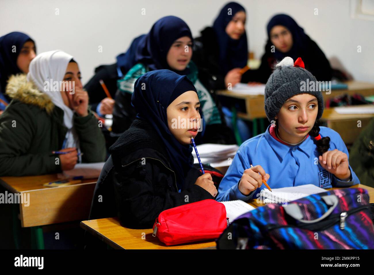 In this Thursday, Jan. 10, 2019 photo, Syrian refugee students attend a ...