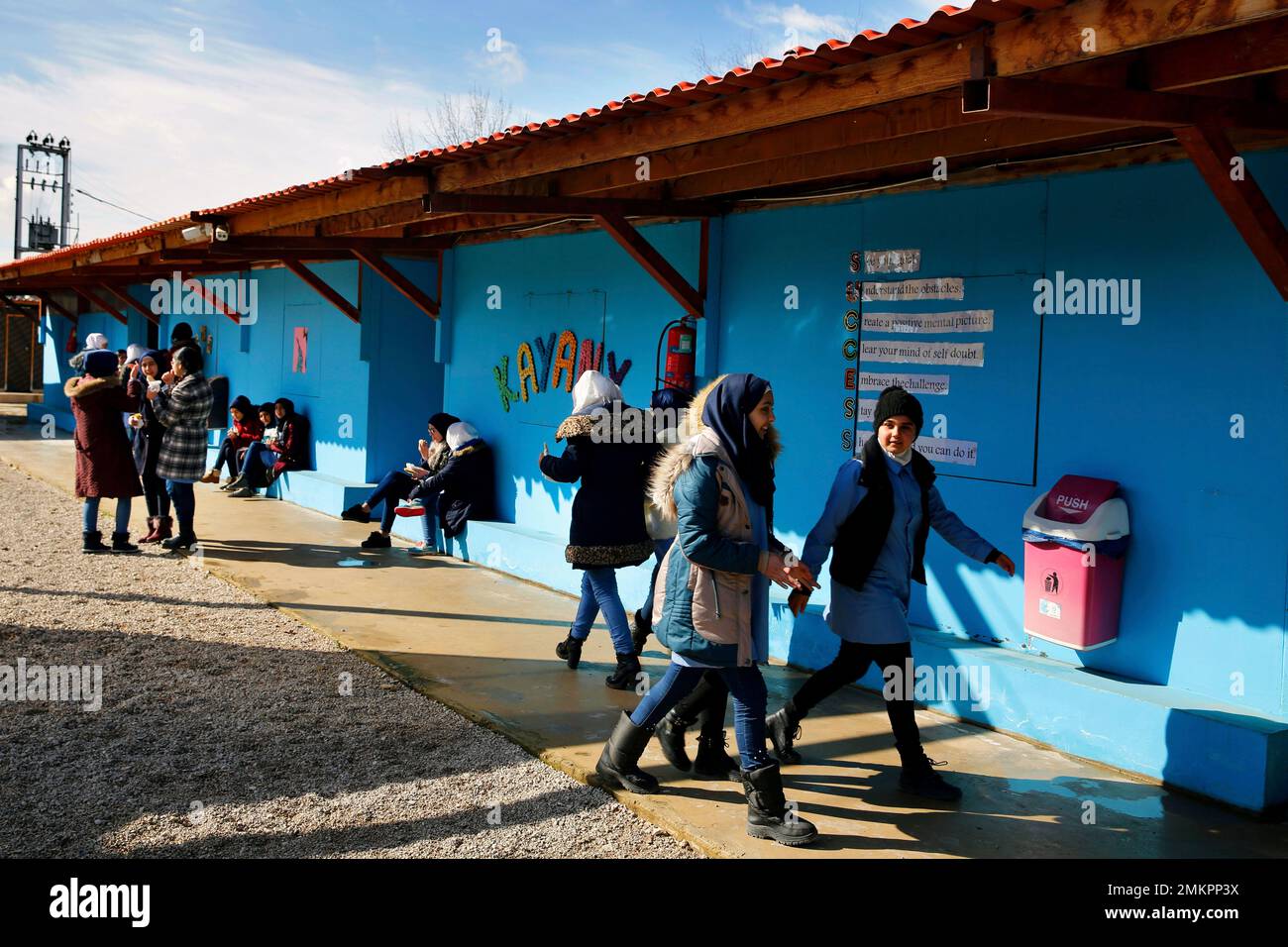 In this Thursday, Jan. 10, 2019 photo, Syrian refugee students walk in ...