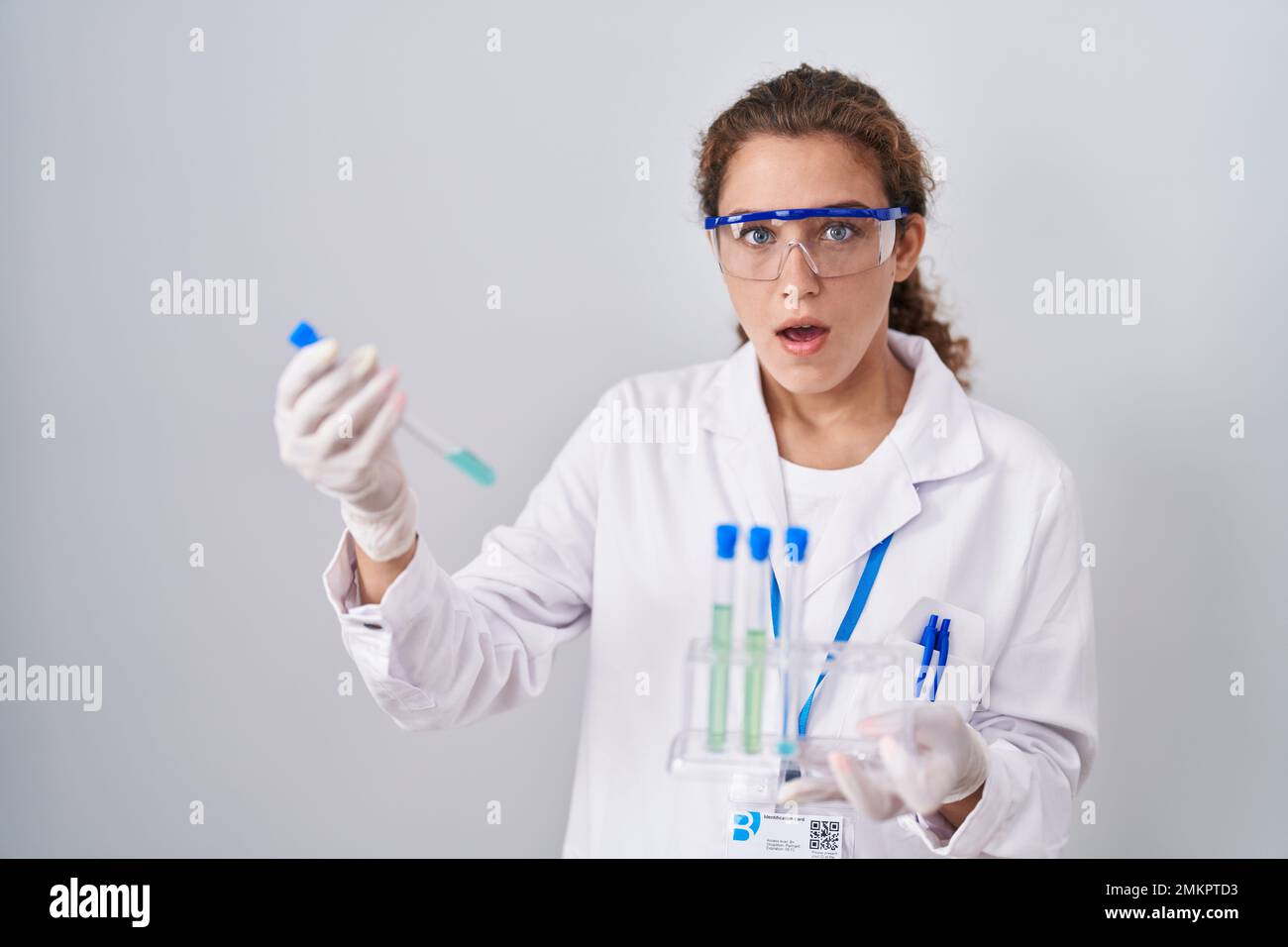 Young caucasian scientist woman working with laboratory samples in ...