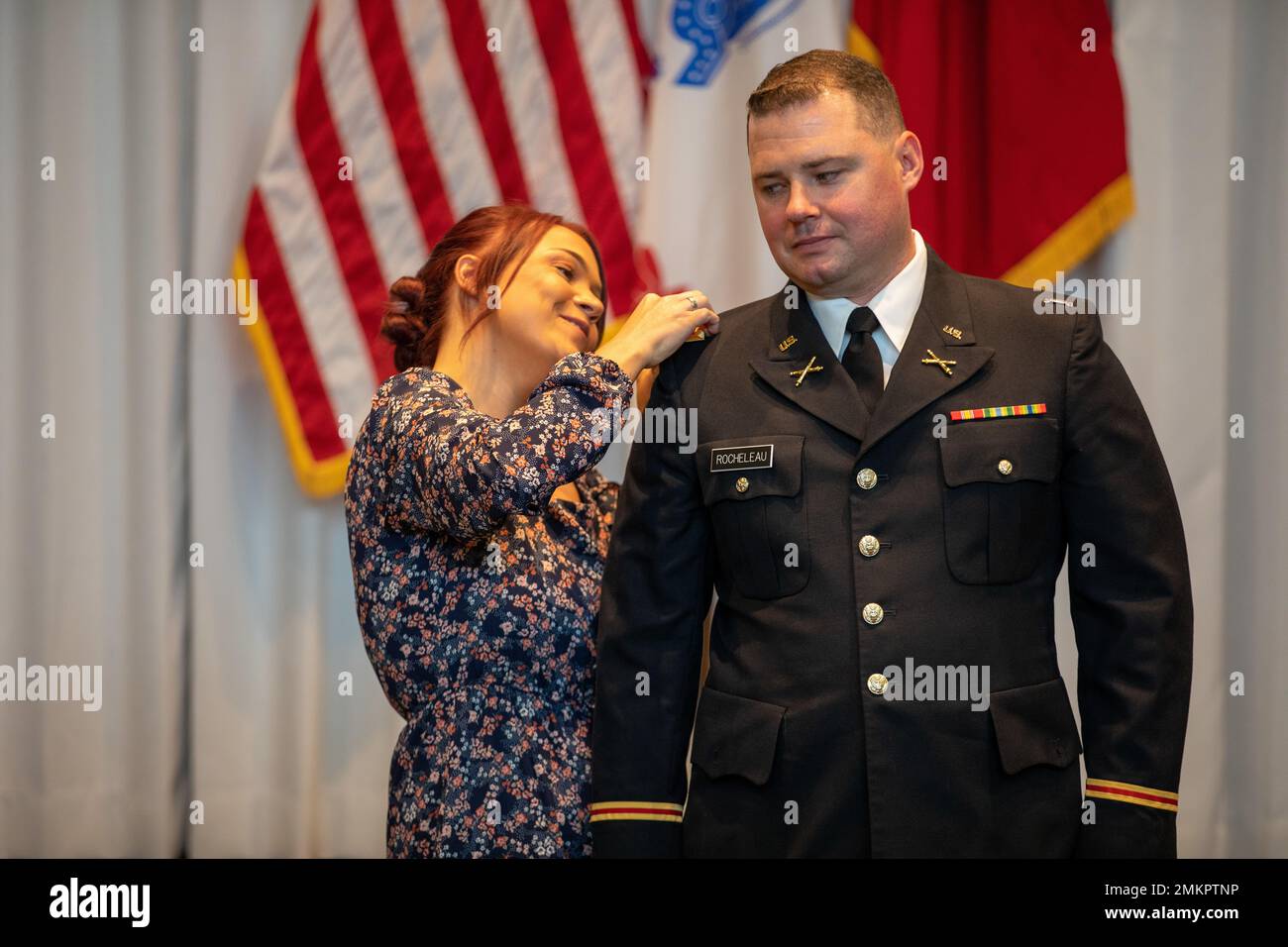 2nd Lt. Sean Rochealeau is pinned his new rank by his wife, Jayden ...