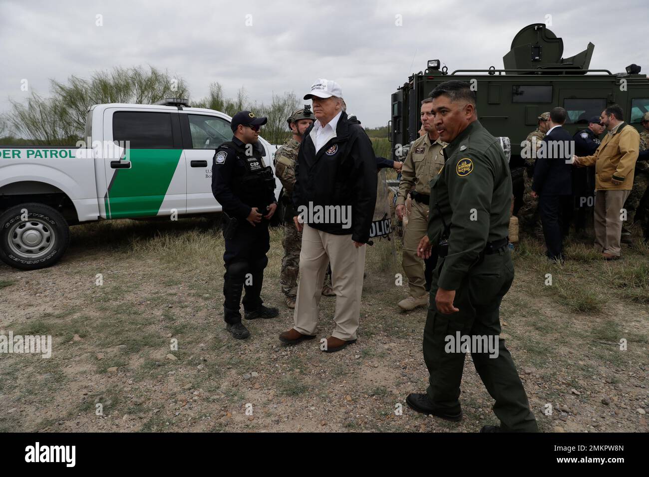 President Donald Trump tours the U.S. border with Mexico at the Rio ...