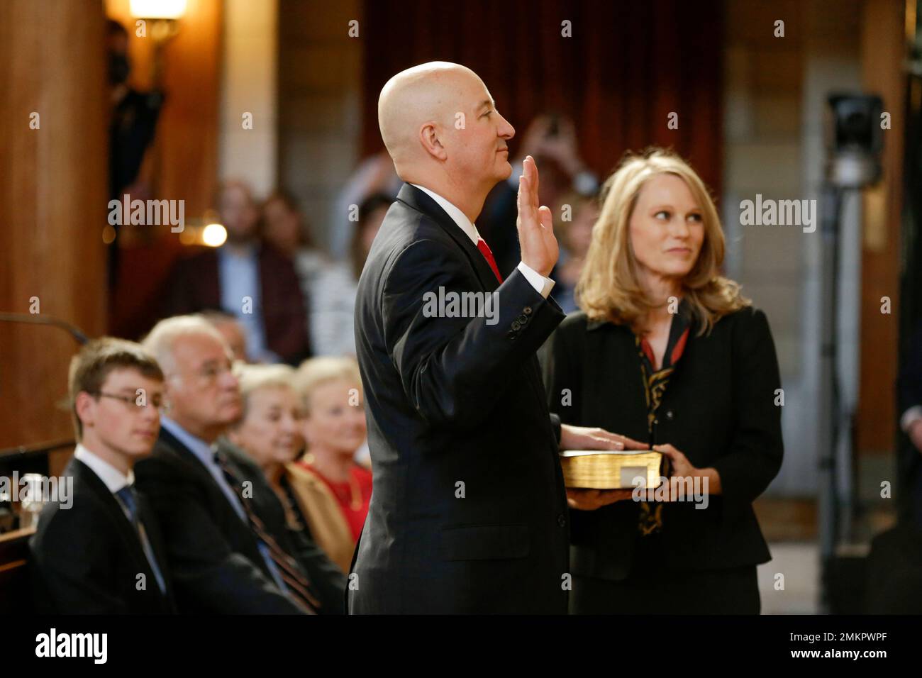 Neb. Gov. Pete Ricketts, with First Lady Susanne Shore by his side and ...