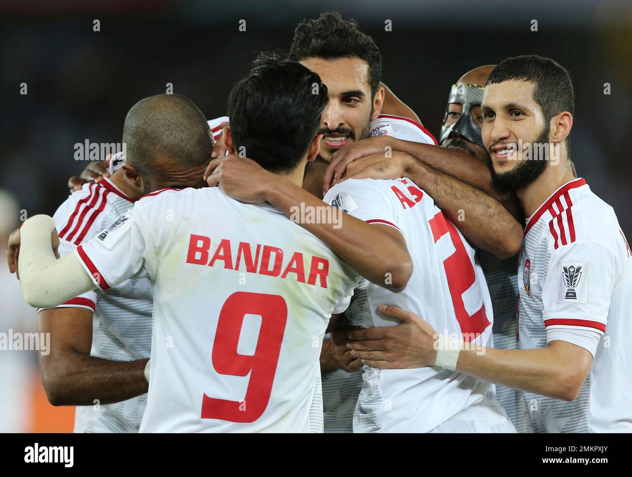 United Arab Emirates' forward Ali Mabkhout al Hajeri, center ...