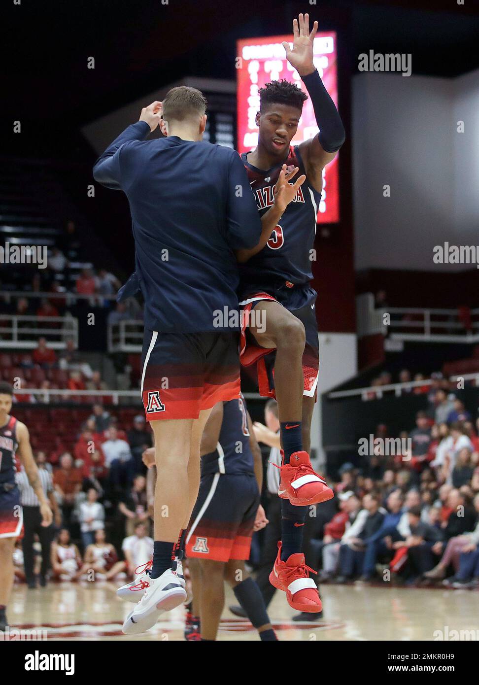 Arizona guard Brandon Randolph, right, celebrates with teammates after ...