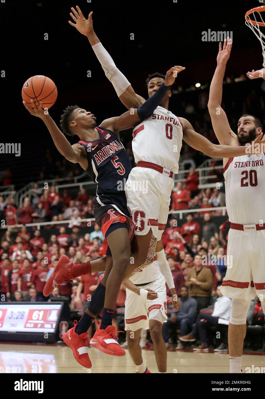 Arizona guard Brandon Randolph (5) shoots against Stanford forward KZ ...