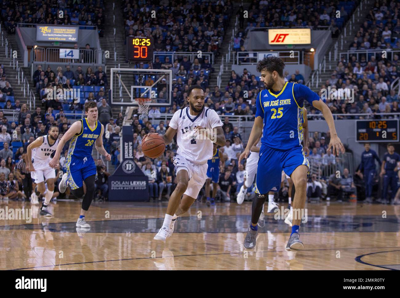 Nevada guard Corey Henson (2) brings the ball up as San Jose State ...