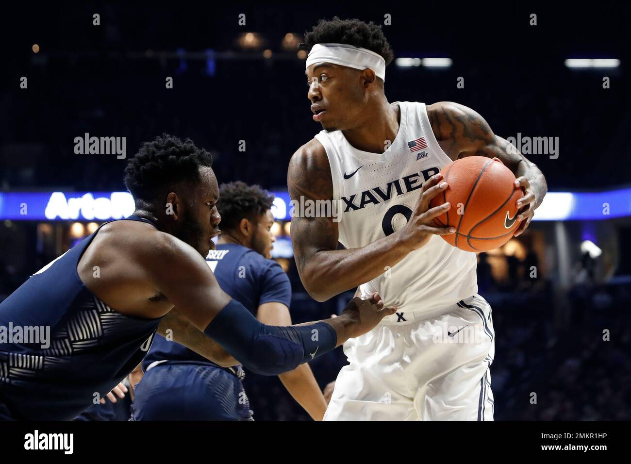 Xavier's Tyrique Jones looks to pass during the first half of an NCAA ...