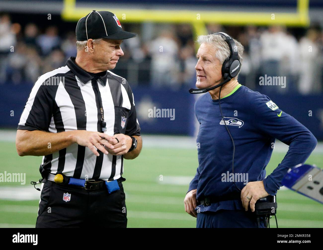 Seattle Seahawks head coach Pete Carroll, right, talks with an official ...