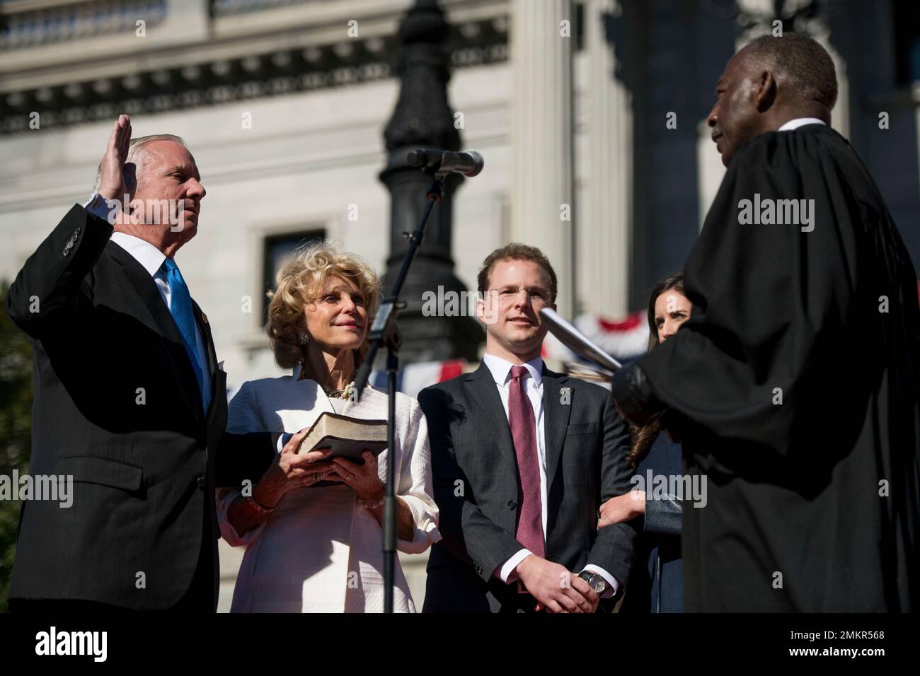 South Carolina Gov. Henry McMaster, left, takes the Oath of Office with ...
