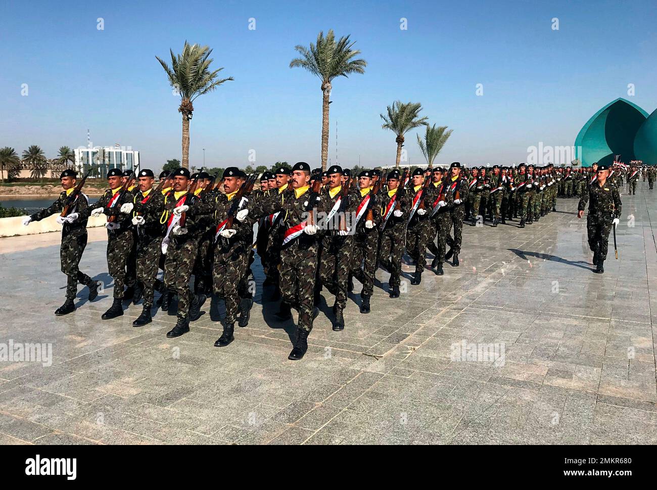 Iraqi federal police march during Police Day celebrations at Martyr's ...
