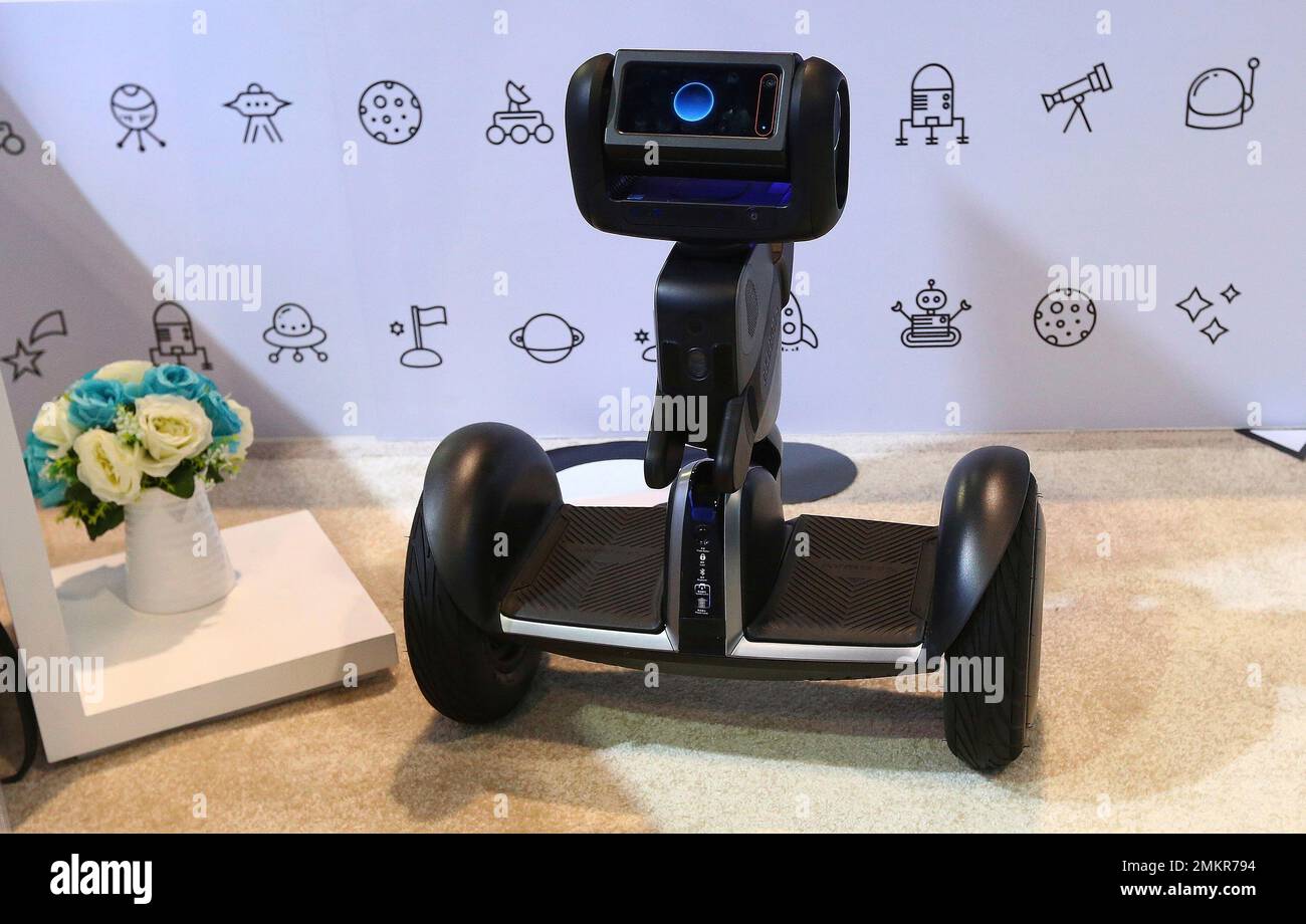 Segway shows off the new Segway-Ninebot Loomo Delivery robot which is ...