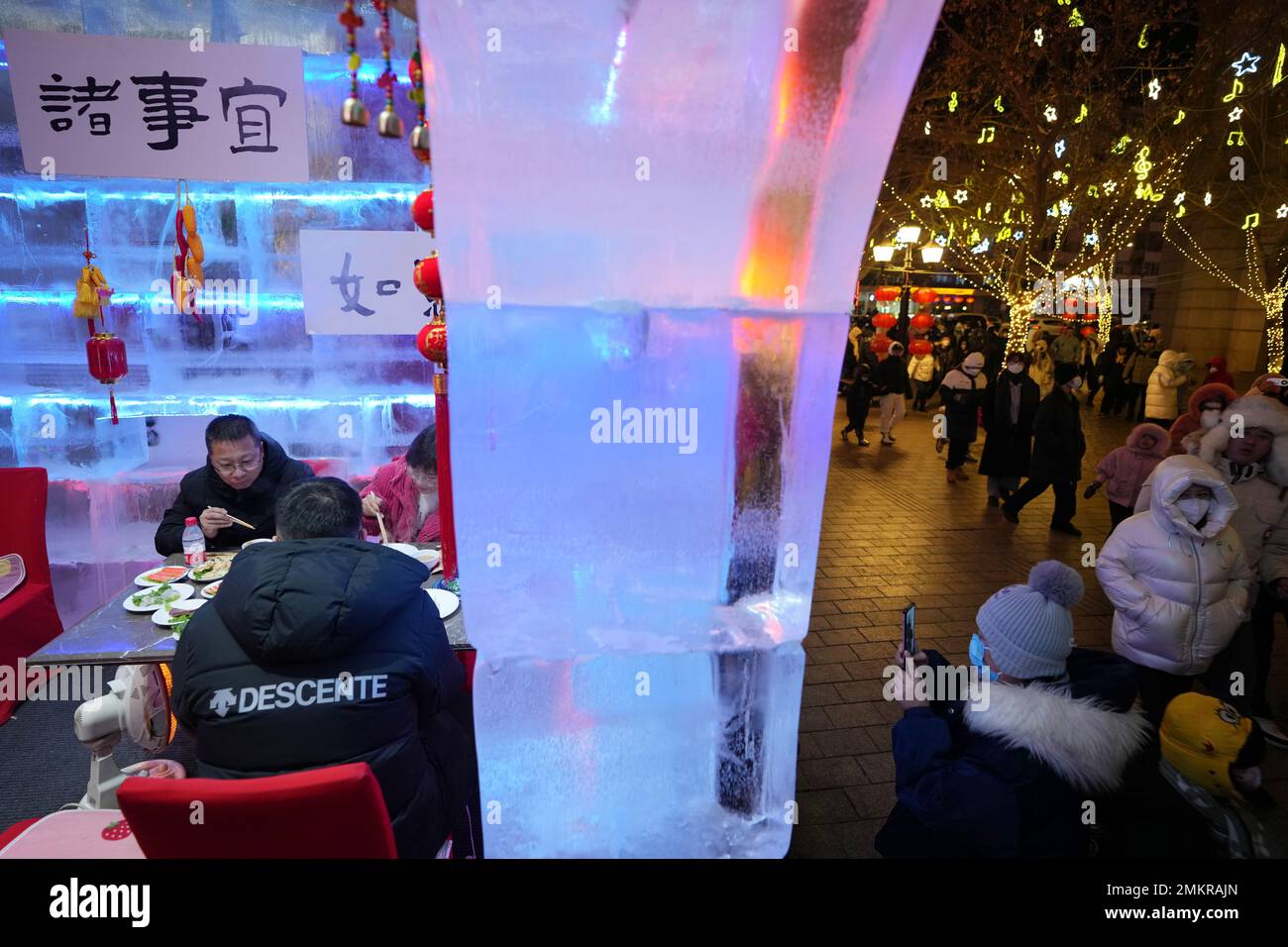 Harbin, China's Heilongjiang Province. 28th Jan, 2023. Tourists enjoy ...
