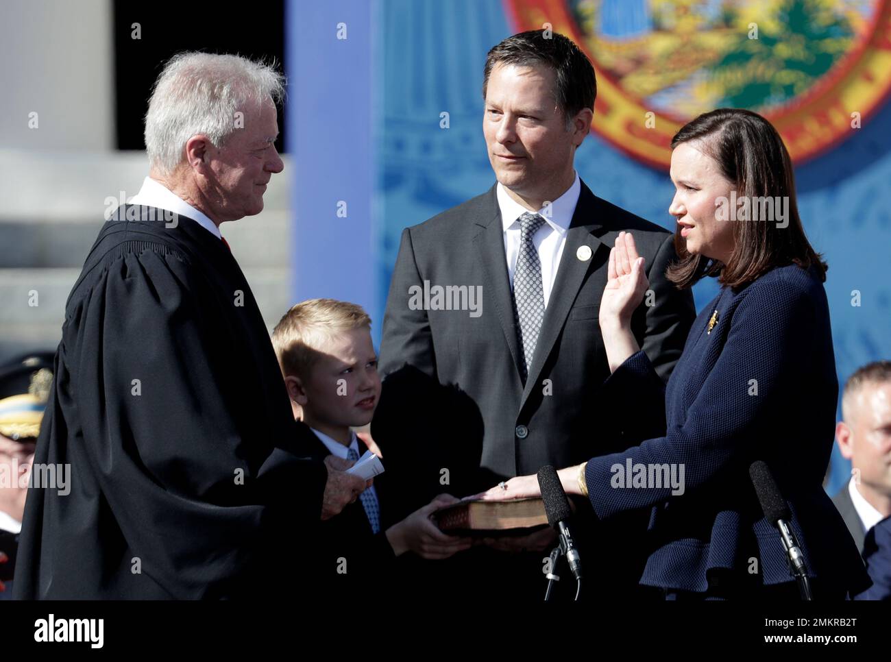 Ashley Moody, right, is sworn in as Florida Attorney General by Judge ...
