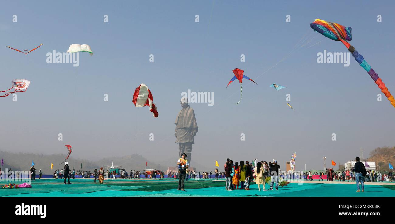 Kites fly near the Statue of Unity, the world's tallest statue, during ...