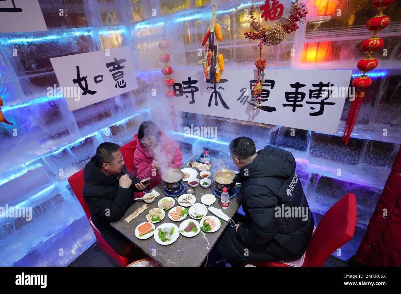 Harbin, China's Heilongjiang Province. 28th Jan, 2023. Tourists enjoy ...