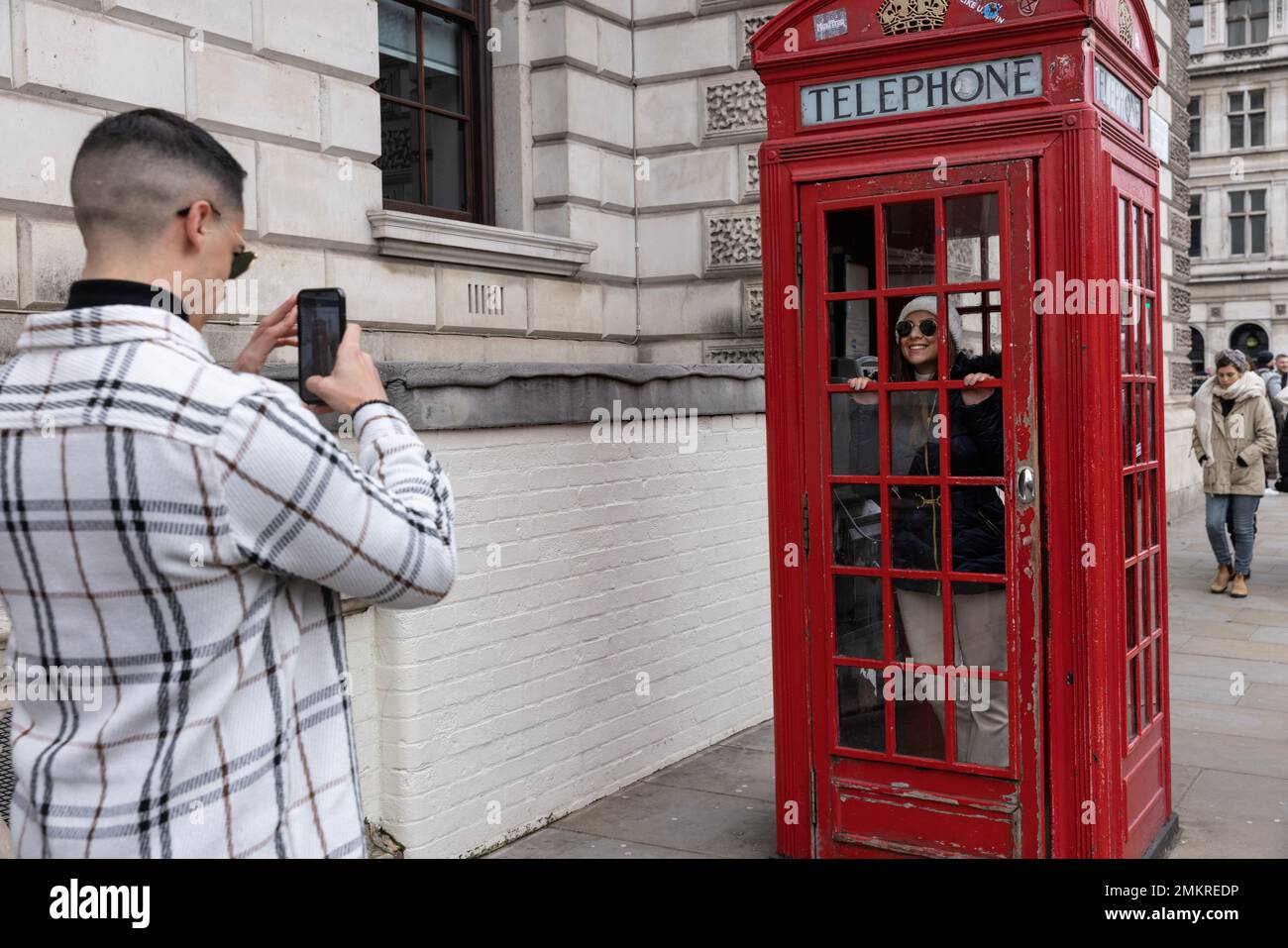 Tourists take selfies at Great George Street, Westminster one of London ...