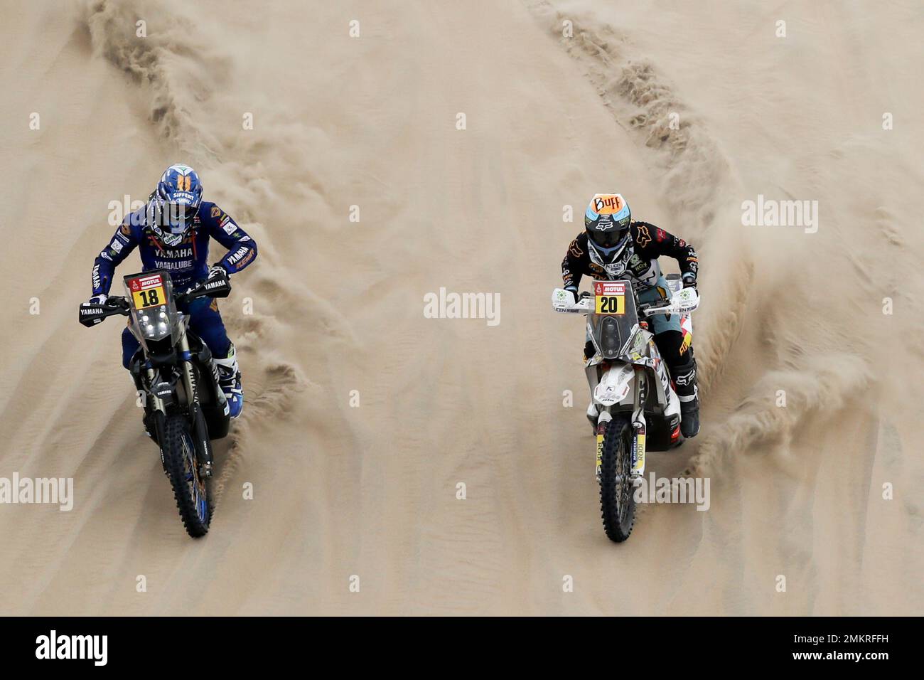 Armand Monleon of Spain, right, rides his KTM chased by Yamaha's rider ...