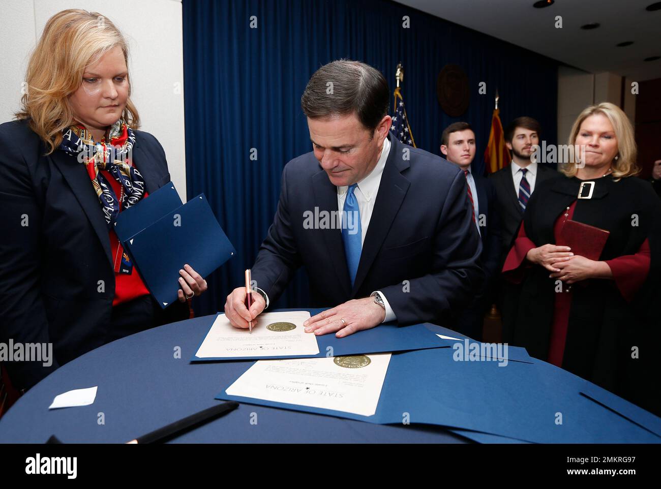 Arizona Gov. Doug Ducey, R, is sworn in for his second term during his ...