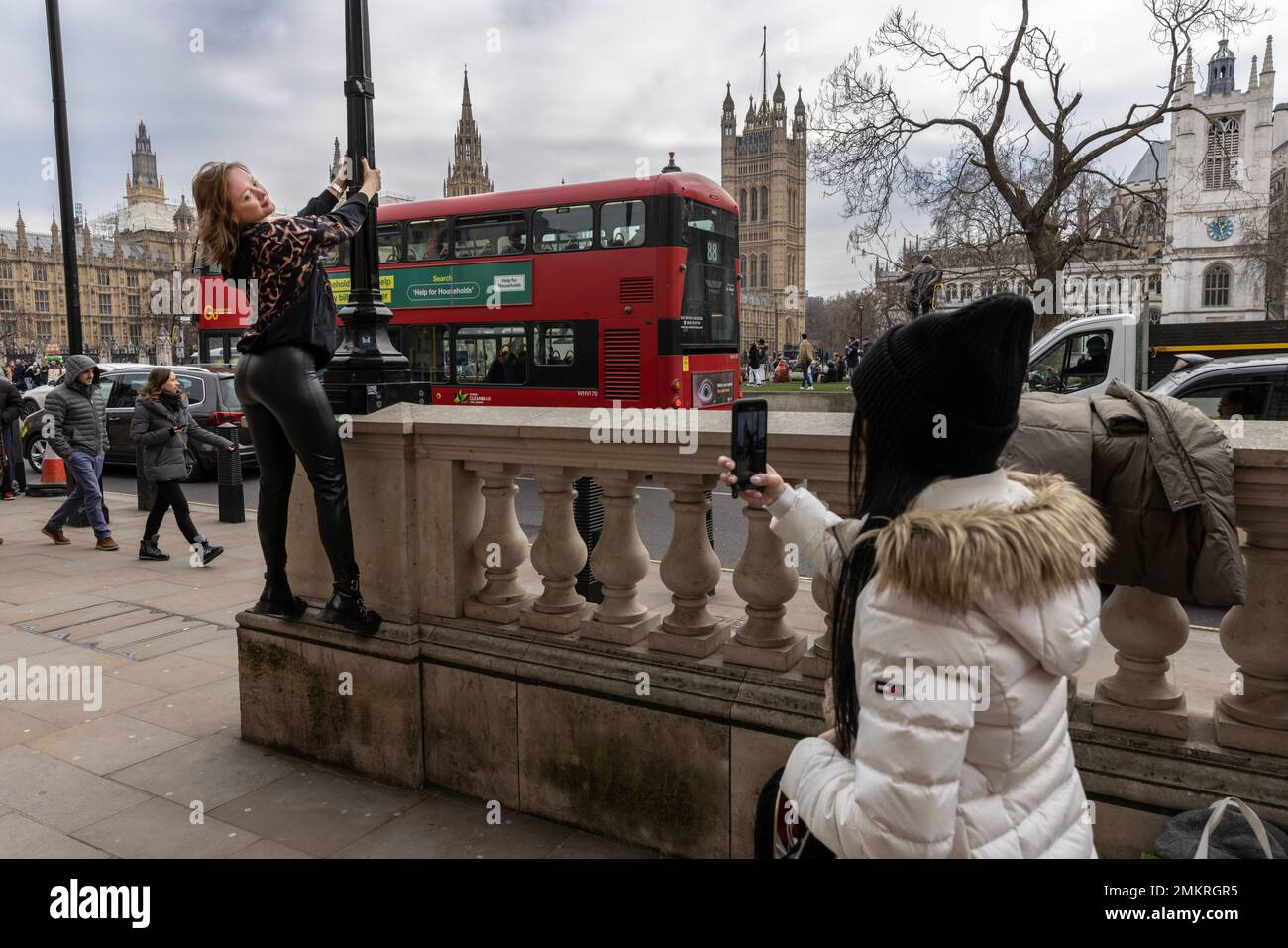 Tourists take selfies at Great George Street, Westminster one of London's most popular tourist ...