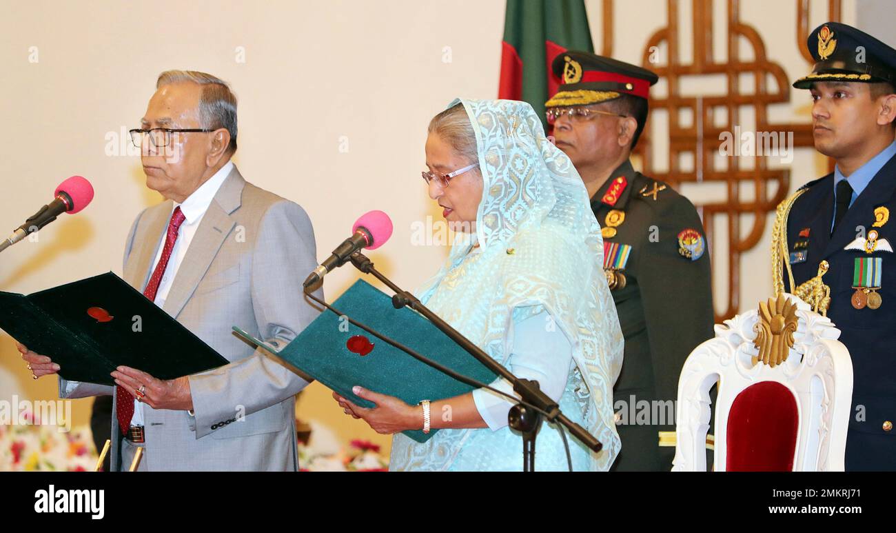 Bangladeshi President M. Abdul Hamid, left, administers the oath of ...